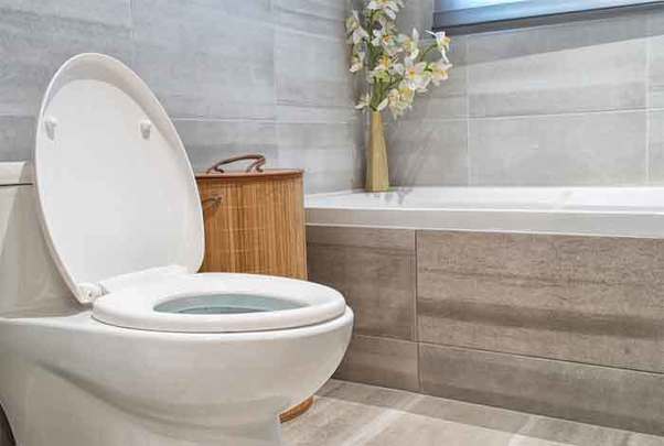 Toilet Fills Up Then Drains Slowly: Causes & Solutions